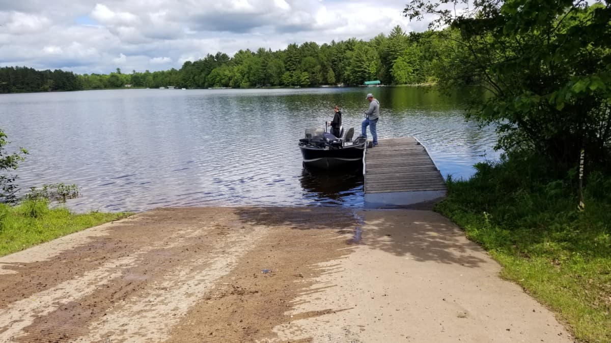 The landing has a nice concrete slab and wooden dock. Launching the ...